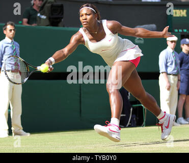 Serena Williams stretches on the court during a practice session ahead ...