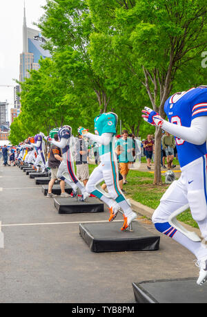 NFL team mannequins set up so that fans can take photos in their team's ...