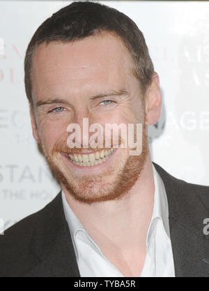 Irish-German actor Michael Fassbender (L), US actress Gina Carano and ...