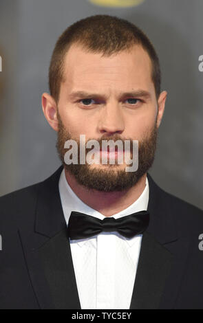 Northern Irish actor Jamie Dornan (right) with his sister Jessica Dornan Lynas and father Dr Jim ...