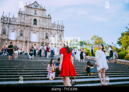 Red dress to Macau Stock Photo - Alamy