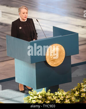 Berit Reiss-Andersen, Chair of the Norwegian Nobel Committee, attends ...