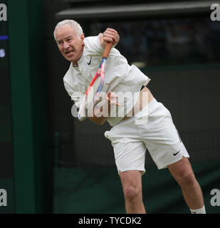 American John Mcenroe plays an exhibition doubles match against ...