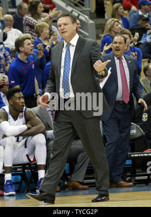 Kansas head coach Bill Self watches his team go through a brief shoot ...