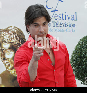 Actor Bryan Dattilo arrives for a photocall for the television show ...