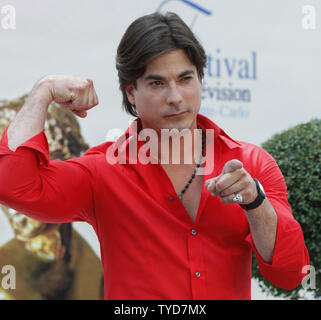 Actor Bryan Dattilo arrives for a photocall for the television show ...