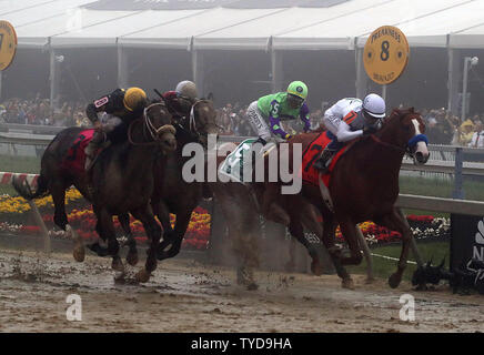 Justify, Mike Smith up, (right) wins the 143rd running of the Preakness ...