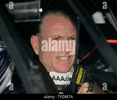 Mark Martin waits for Nextel Cup Series practice at Kansas Speedway in ...