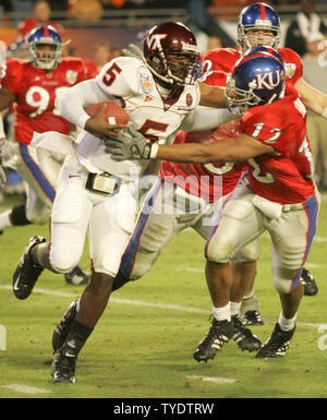 Virginia Tech Hokies quarterback Tyrod Taylor (5) celebrates with wide ...