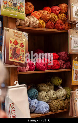 Display of different coloured knitting wools Stock Photo - Alamy