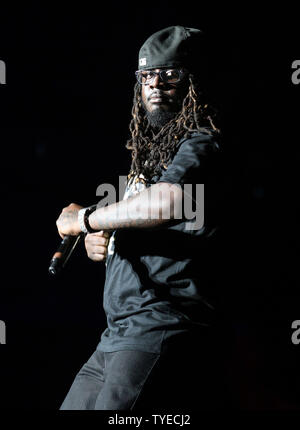 T-Pain performs in concert at Sun Life stadium in Miami on November 23 ...