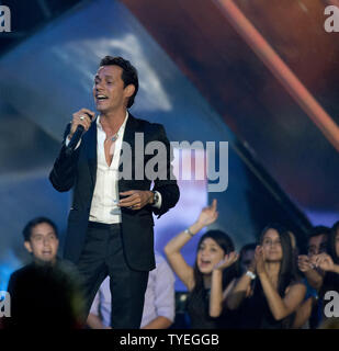 Singer Marc Anthony performs during the dedication ceremony for the ...