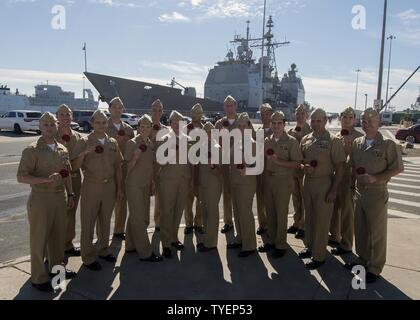 US Navy Three of the Navy's top Command Master Chiefs (CMCs) observe an ...