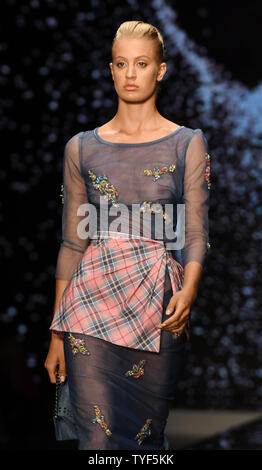 A model presents a creation by Rene by RR fashion designer during Miami ...