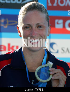 American diver Laura Wilkinson, of Spring, Tex., beams after collecting ...