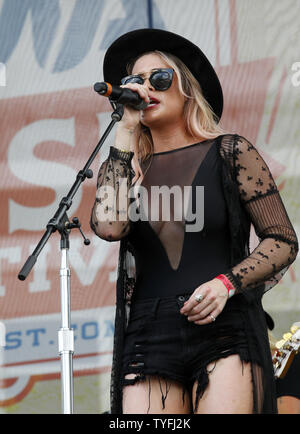 Country music band Stella James performs during the CMA Music Festival ...