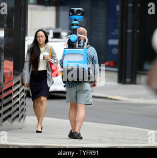 google street view walker trekker Stock Photo - Alamy