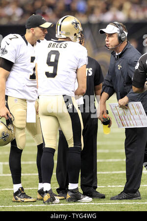 New Orleans Saints' Luke McCown (7) greets Carolina Panthers' Cam ...