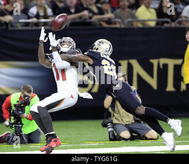 New Orleans Saints cornerback Ken Crawley (20) stops Atlanta Falcons ...