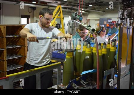 A Crane Army Ammunition Activity explosives handler displays a warning ...