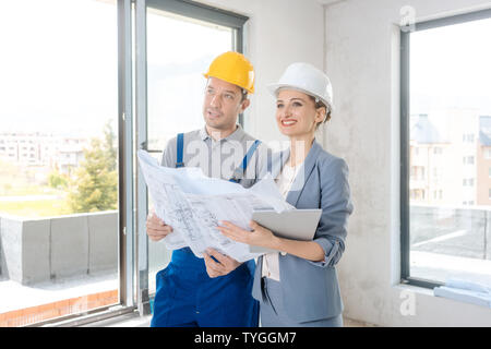 Project owner and construction worker during acceptance Stock Photo - Alamy
