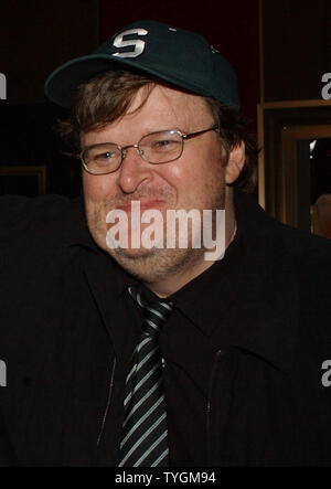 Academy Award winning director/documentarian Michael Moore poses on ...