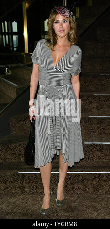 Elizabeth Hendrickson poses for pictures at the Holly Kristen Fashion ...