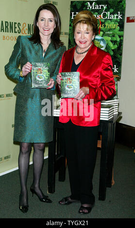 Mary Higgins Clark (right) and daughter Carol Higgins Clark sign copies ...