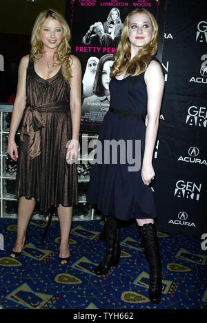 Evan Rachel Wood, left, And Laura Dern arrive to the 69th Annual Golden ...