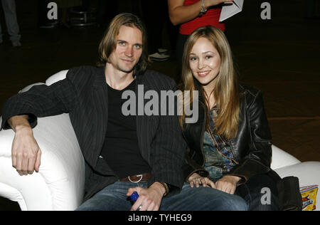 Autumn Reeser and companion Jesse smile for pictures while sitting ...