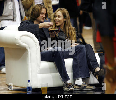 Autumn Reeser and companion Jesse smile for pictures while sitting ...