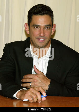 Jorge Posada signs copies of his new book "Play Ball" at Barnes & Noble ...
