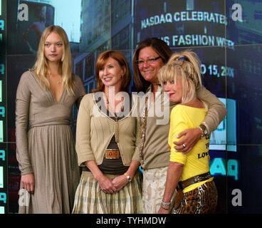 Fashion designer Nicole Miller, left, is greeted by Russian film ...
