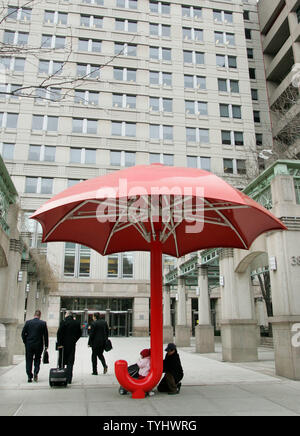 The Citigroup Inc. logo, a large red umbrella, stands at the entrance ...