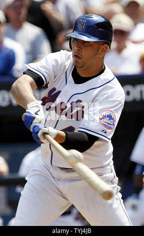 Cincinnati Reds pitcher Kyle Lohse (28) talks with catcher Javier ...