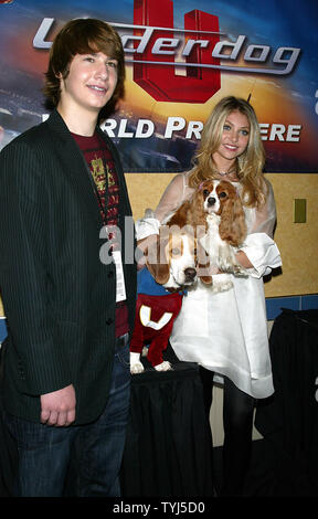 Alex Neuberger and Underdog arrive for the premiere of their new movie ...