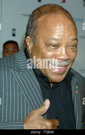 Music producer Quincy Jones poses with actor Paul Newman as they arrive ...