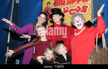 Actress Marcia Gay Harden (C) is joined by ringmaster Carrie Harvey (L ...