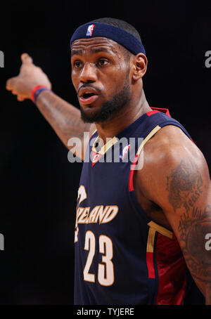 Cleveland Cavaliers' LeBron James points during Game 1 in the second ...
