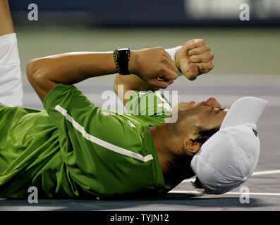 David Ferrer reacts after beating Tommy Haas, 4-6, 6-2, 6-3, in a men's ...