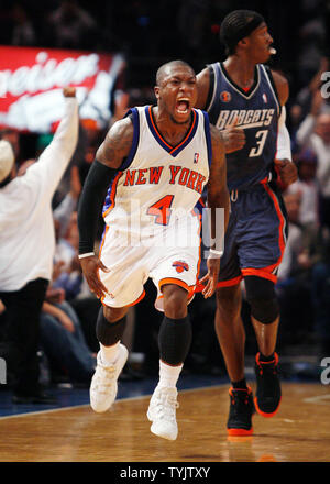 New York Knicks John Wallace dunks the ball through the hoop against ...