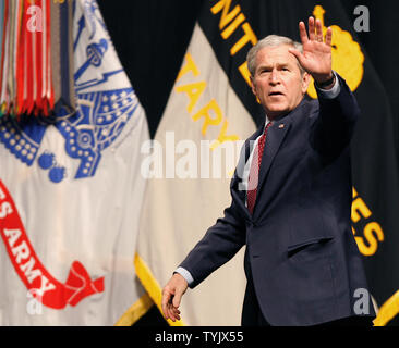 President George W. Bush waves to the cadets after speaking at the West ...