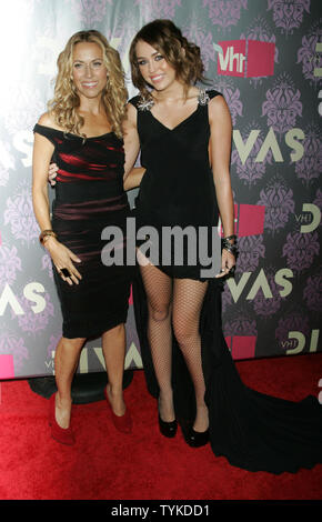 Miley Cyrus and Sheryl Crow arrive at the VH1 Divas concert, in New York on Thursday, Sept. 17 ...