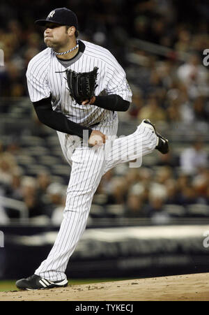 New York Yankees' Joba Chamberlain pitches in the first inning against ...