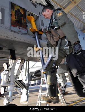Lt. Col. John Marks, a pilot with the 303rd Fighter Squadron, parks his ...