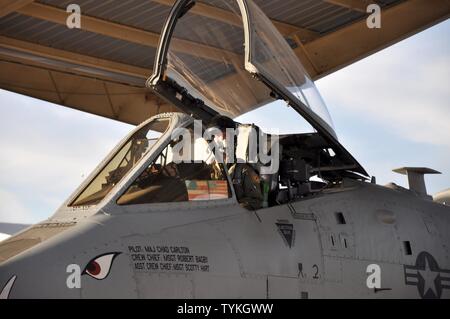 Lt. Col. John Marks, a pilot with the 303rd Fighter Squadron, parks his ...