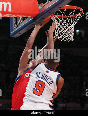 Philadelphia 76ers' Jason Smith tries to block a shot by Charlotte ...