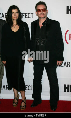 Bono and his wife, Ali Hewson, arrive for the formal Artist's Dinner ...