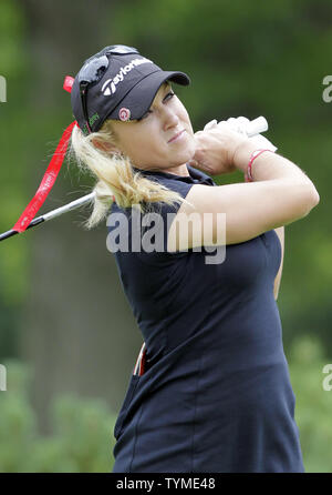 Natalie Gulbis hits her tee shot on the third hole in the second round ...