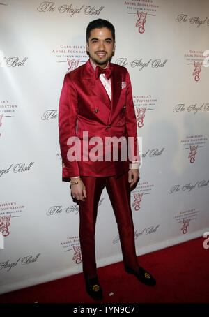 DJ Cassidy arrives on the red carpet at the Billboard Women in Music ...